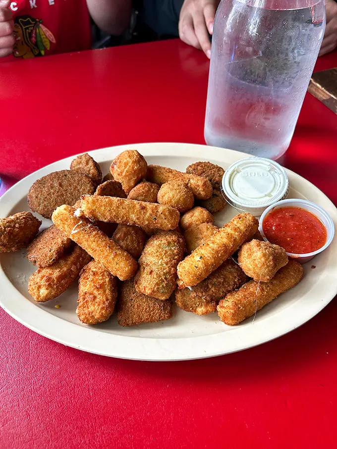 This isn't just an appetizer plate—it's a golden, crispy prelude to pizza greatness. Patience is easier with fried goodness to tide you over.