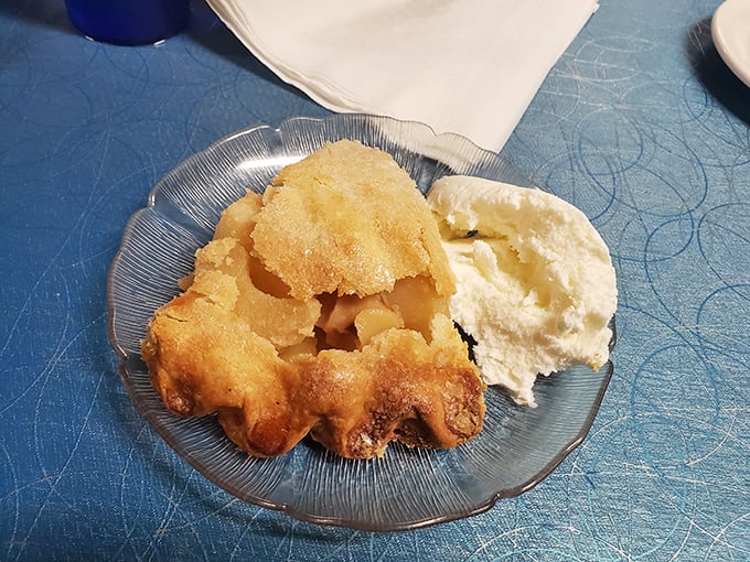 Golden-fried perfection meets vanilla ice cream in this apple pie à la mode. The contrast of warm apple filling and cold ice cream creates a temperature tango in your mouth.