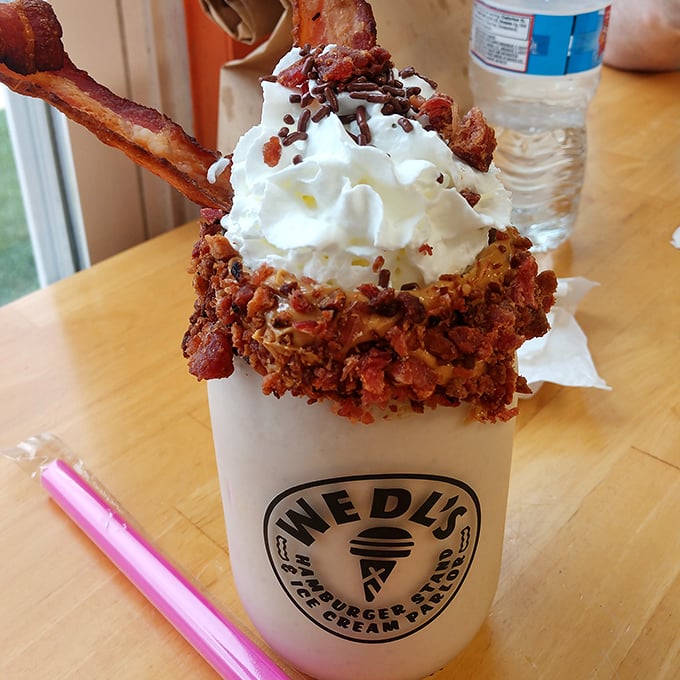 Culinary mad science at its finest—a towering creation combining ice cream, whipped cream, bacon and chocolate that somehow makes perfect sense.