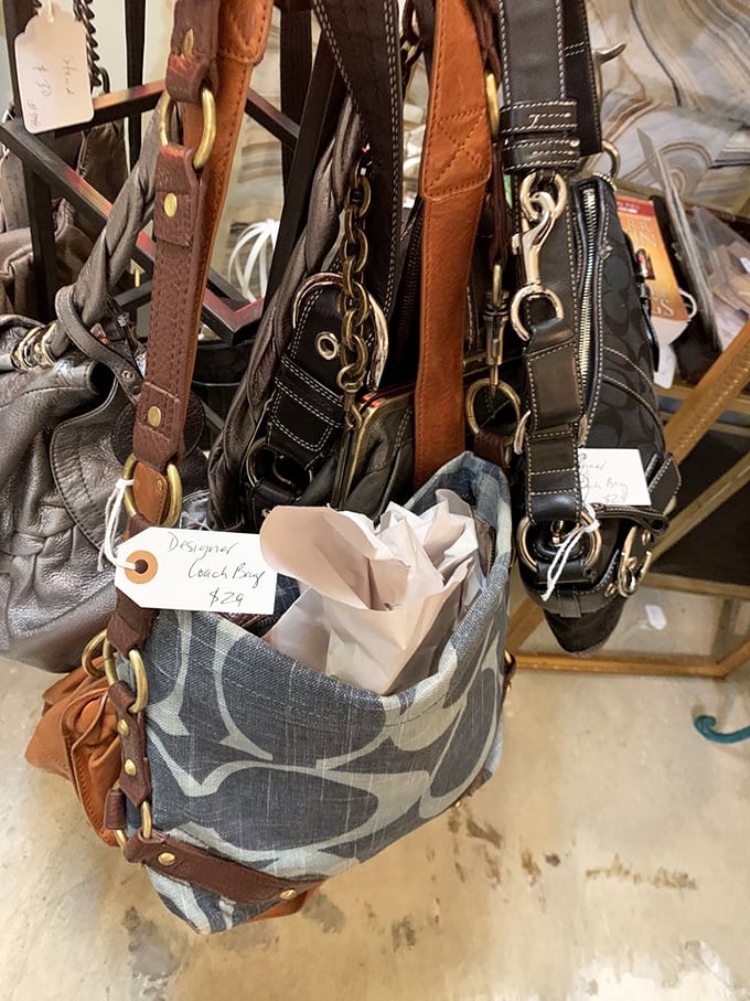 Designer handbags waiting for their second act. These leather beauties have probably attended more interesting parties than most of us.