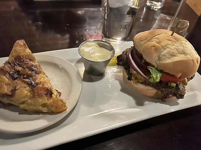 A proper pub burger with what appears to be scalloped potatoes—proof that not all British food deserves its bland reputation. This is pub grub elevated.