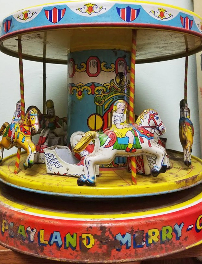This vintage "Playland Merry-Go-Round" toy didn't just entertain children—it trained an entire generation to expect horses to have permanently startled expressions.