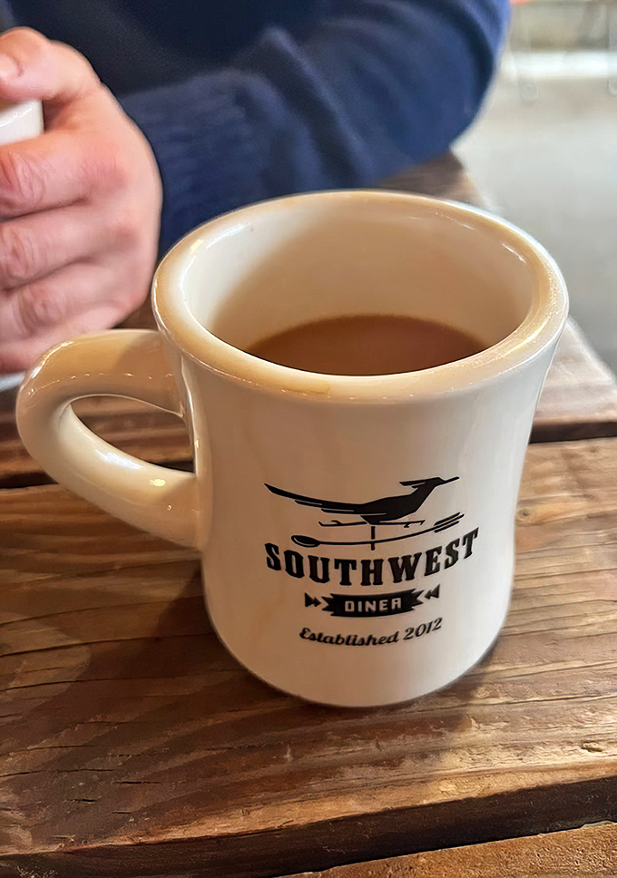 The Southwest Diner mug – holding what's likely the lifeblood of morning conversations and weekend revelations since 2012.