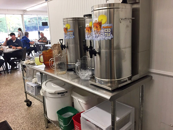 Sweet tea dispensers standing at attention like sentinels guarding liquid Southern happiness. One sip and your dentist will feel a disturbance in the force.