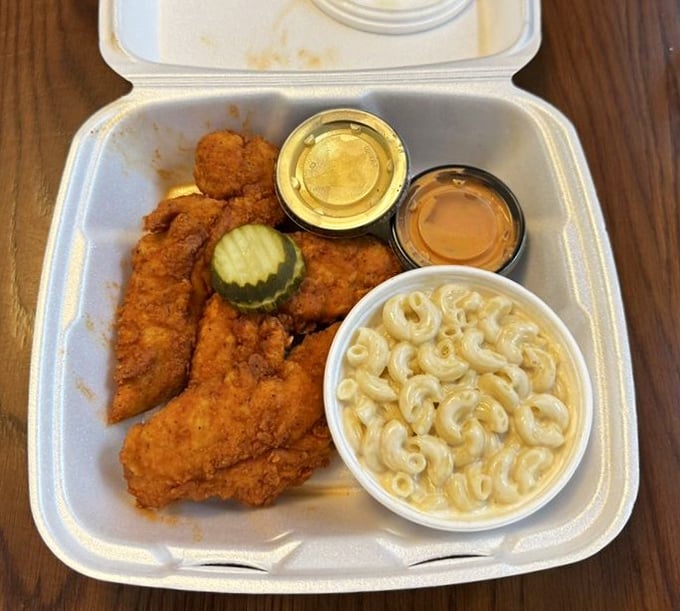 Creamy mac and cheese plays the perfect wingman to crispy chicken tenders—a partnership more harmonious than Simon and Garfunkel.