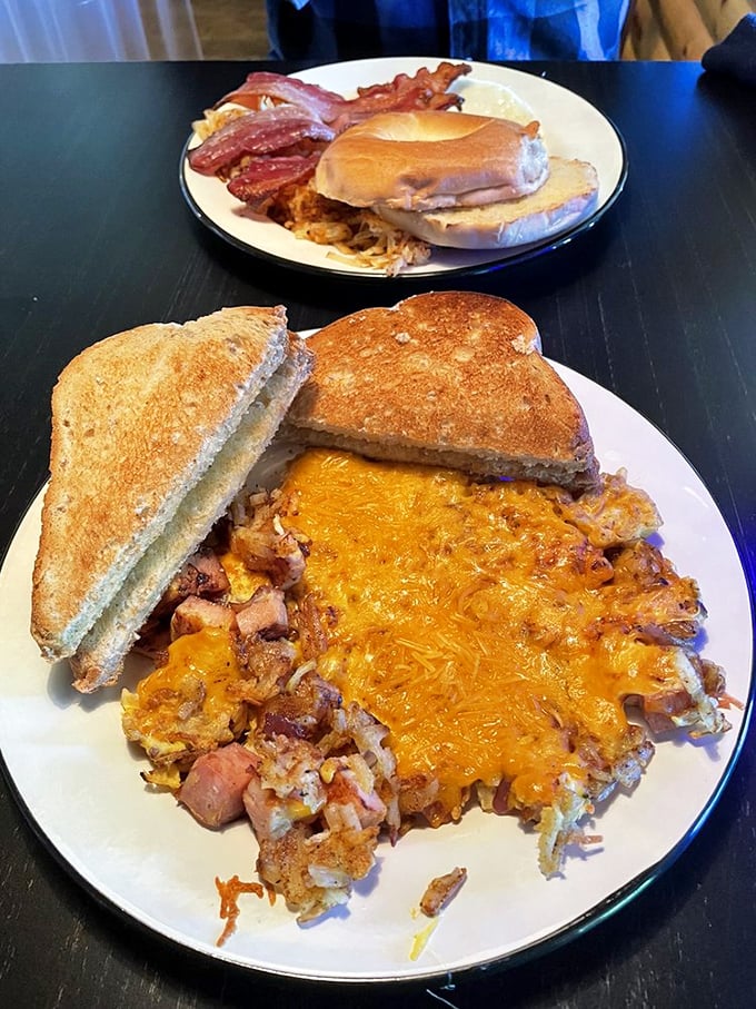 Breakfast of champions! Golden hashbrowns and melted cheese with toast – the kind of plate that fuels a day of paddling or simply more eating.
