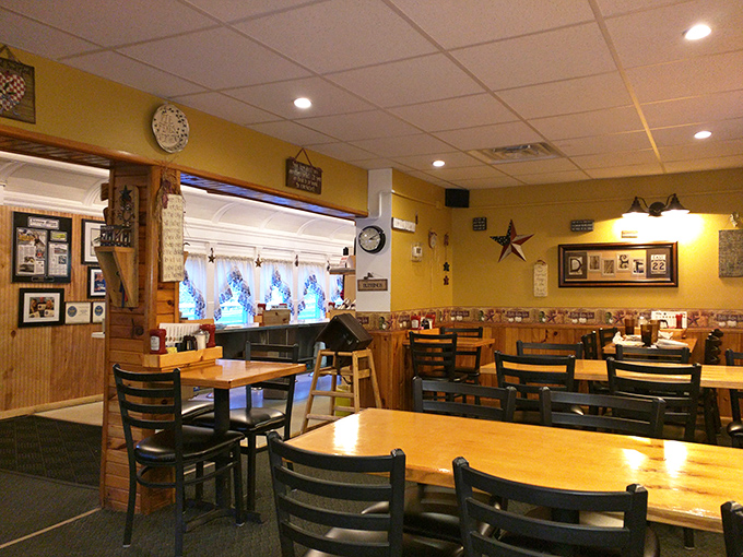 Yellow walls, wooden tables, and ceiling fans spinning stories – the dining room where regulars become family and first-timers become regulars.