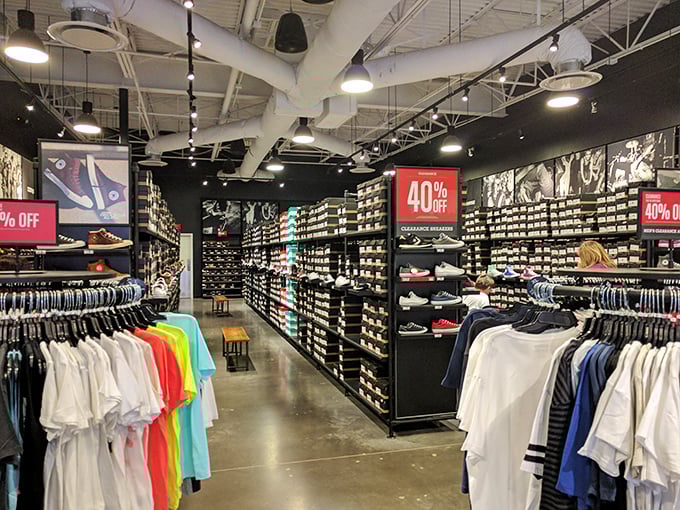 Sneaker nirvana with walls of footwear possibilities—where "just one pair" becomes the lie we tell ourselves at the entrance.
