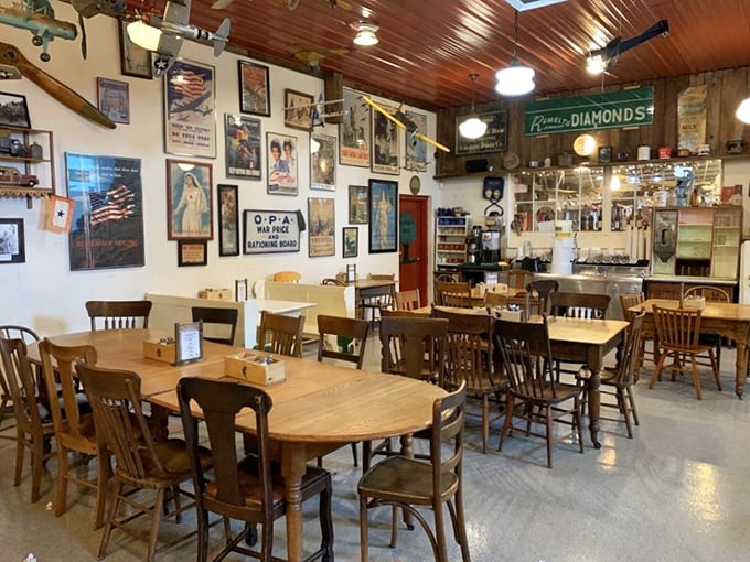 The dining room feels like the community's living room, where vintage signs and wooden tables tell stories of Michigan's agricultural heritage.