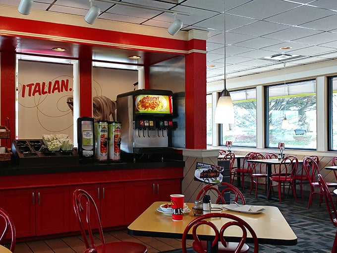 The self-serve beverage station and bright dining area create that casual vibe where nobody minds if your toddler drops a breadstick – we've all been there.