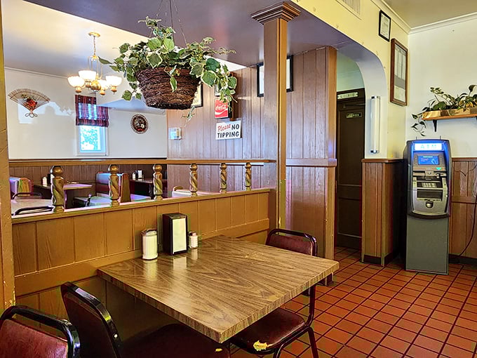 Wood paneling, hanging plants, and booth dividers—this isn't retro décor, it's simply a place that never saw reason to change what works.