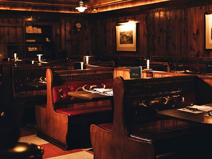 These booths aren't just seating—they're private dining rooms where memories are made between bites of perfectly cooked ribeye.