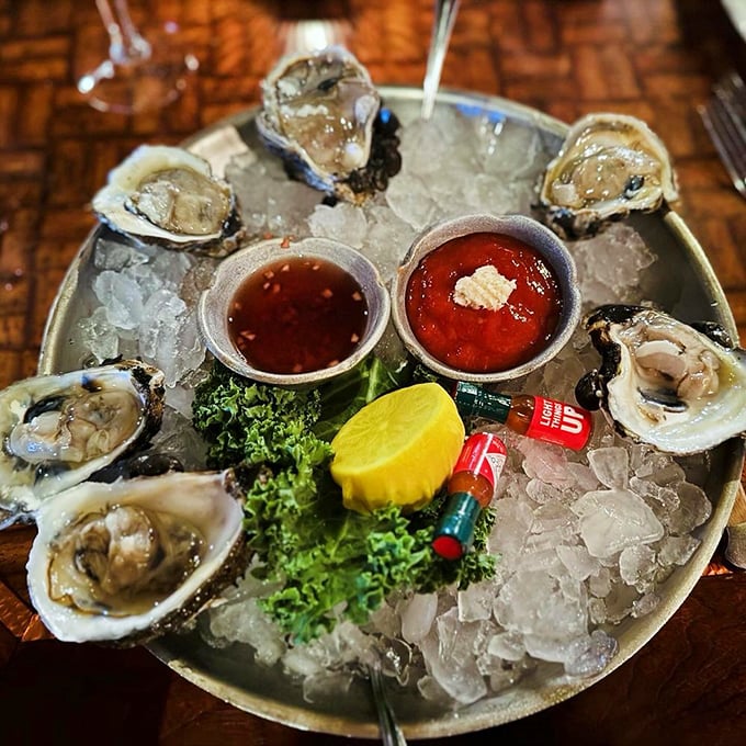 Oysters on ice—nature's perfect appetizer—waiting patiently with their cocktail and mignonette companions for their moment of slurpy glory.