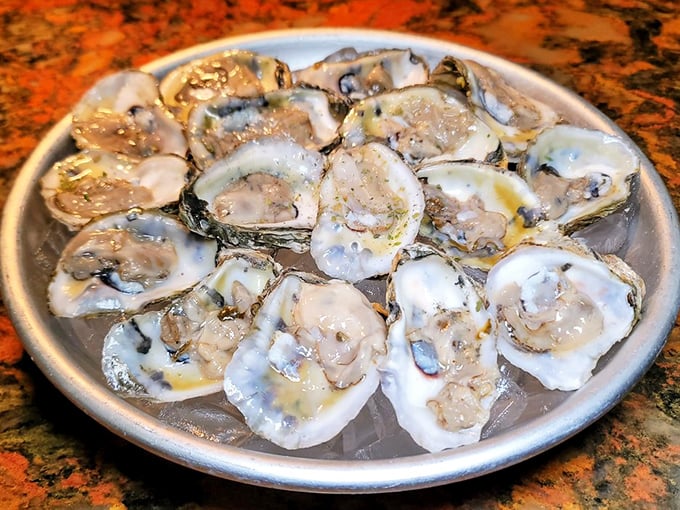 Fresh oysters on the half shell – nature's perfect appetizer. Briny, delicate treasures from the sea that need nothing more than a squeeze of lemon.