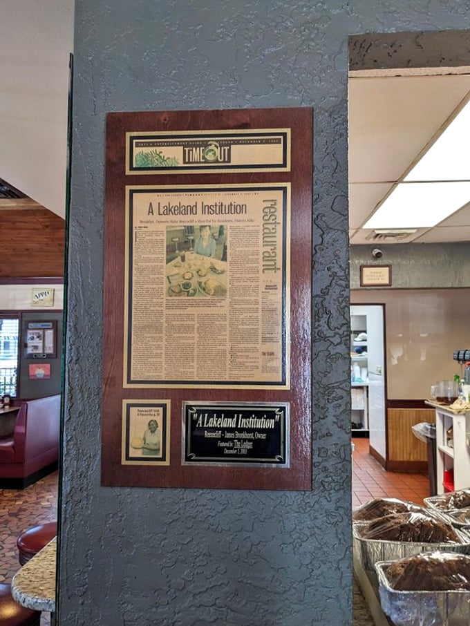 The framed newspaper clipping doesn't just say "A Lakeland Institution"—it's documented proof that some places earn their legendary status honestly.