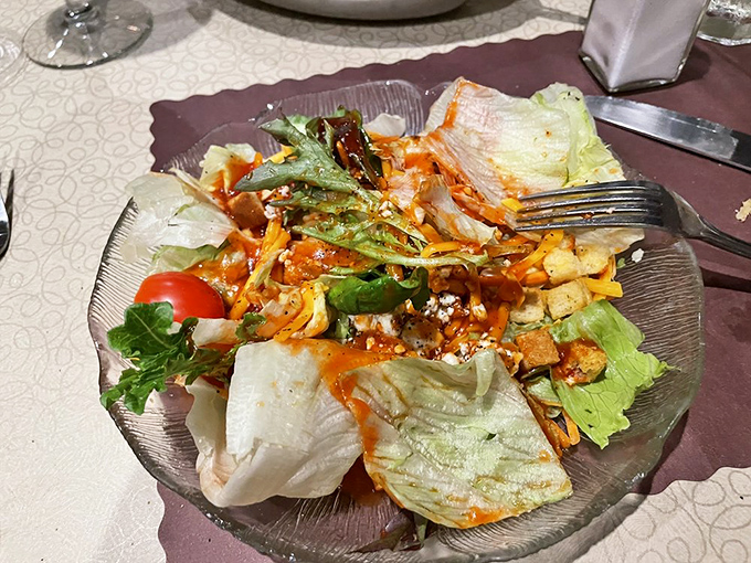 This isn't just a salad—it's the opening act that somehow manages to shine despite knowing the headliner is prime rib.
