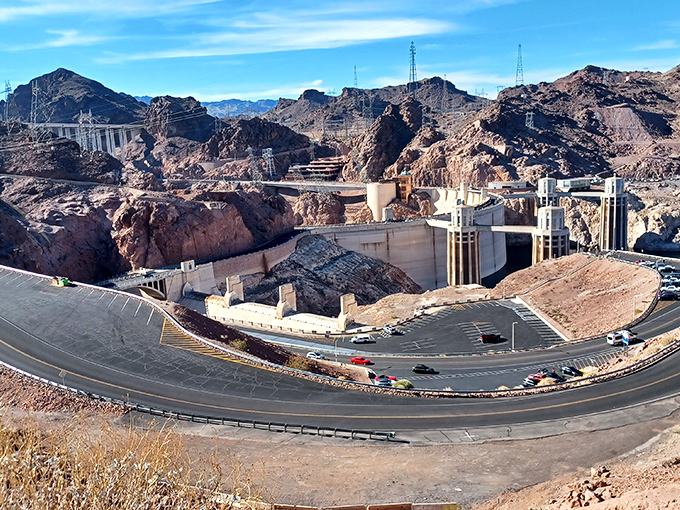 Concrete and steel nestled among ancient stone—like finding an elaborate sandcastle in the middle of geological poetry.