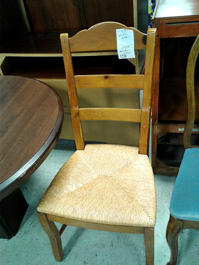 This rustic chair with woven seat isn't just furniture—it's a conversation piece with stories to tell from its previous life.