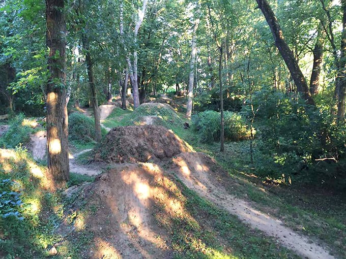Nature's playground near Apple Creek. These dirt jumps weren't designed by committees—they were born from pure joy.
