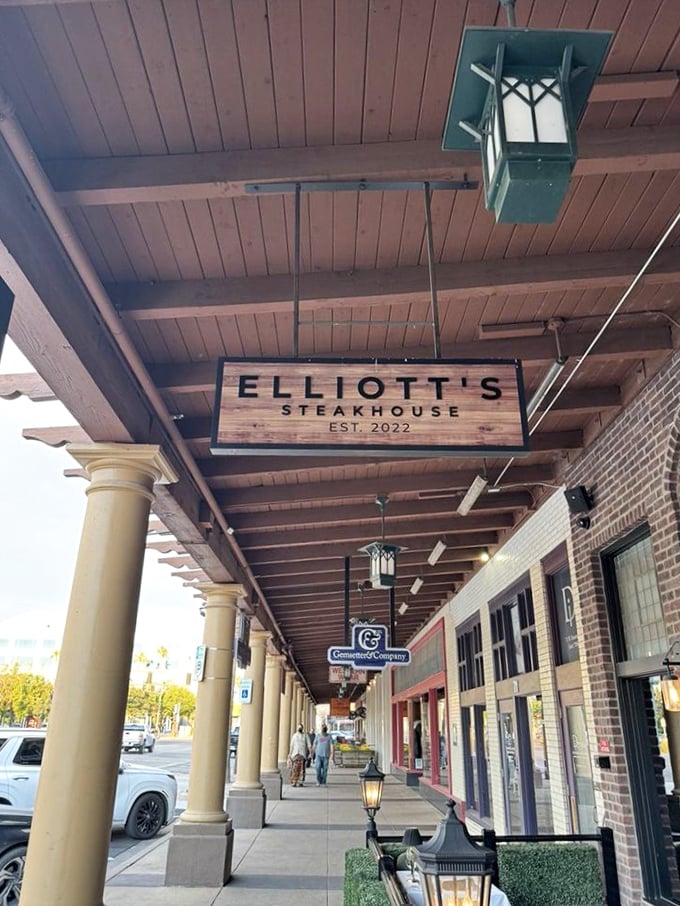 Elliott's wooden sign hanging in downtown Chandler is like a treasure map—X marks the spot for beef perfection.