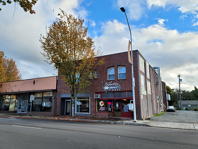 Smoking Monkey Pizza's brick building stands like a sentinel of good taste in downtown Renton—guarding the sacred flame of proper pizza.