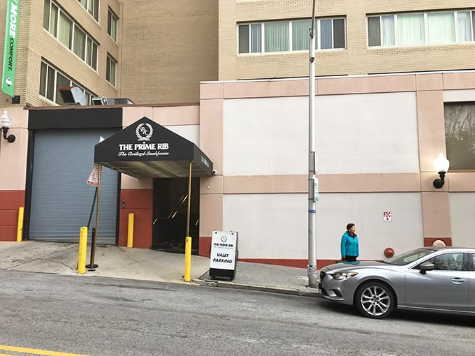 The Prime Rib's understated entrance conceals Baltimore's most sophisticated steak experience. That awning is the gateway to beef nirvana!