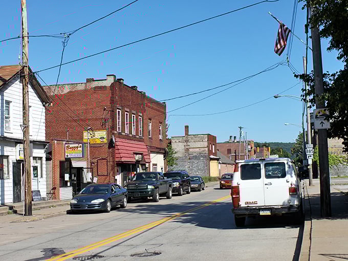 The simple storefronts of Clairton tell a story of authentic small-town living where your Social Security check feels like a winning lottery ticket.