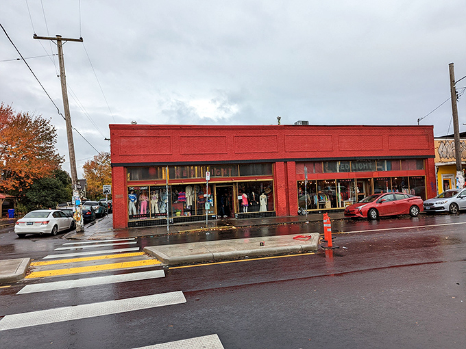 Rain-slicked streets lead to the Red Light, where vintage fashion dreams come true regardless of weather.