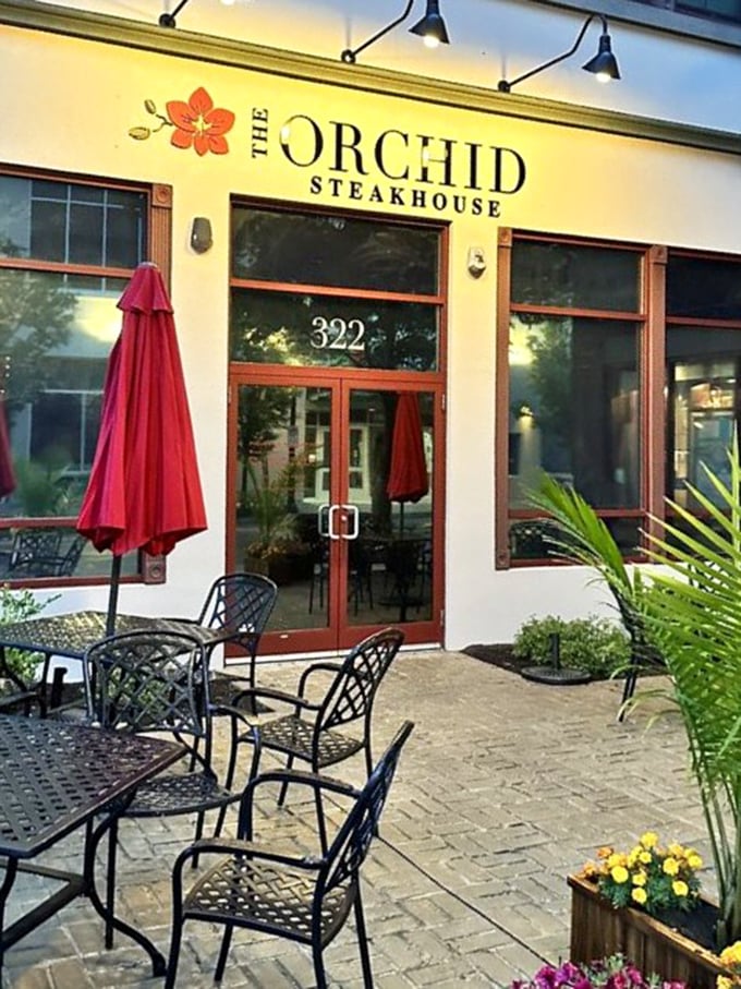 Bright flowers welcome you to The Orchid's outdoor seating area. A perfect spot to savor steaks with unexpected Asian twists.