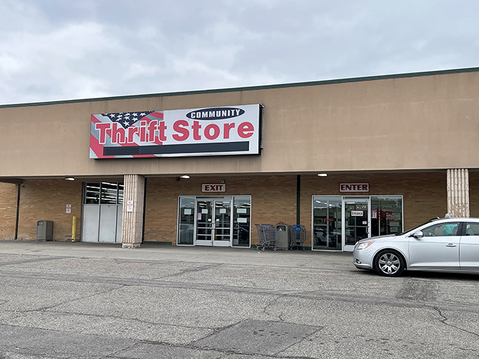 The unassuming exterior of Community Thrift Store – where treasure hunting begins and wallets breathe sighs of relief.