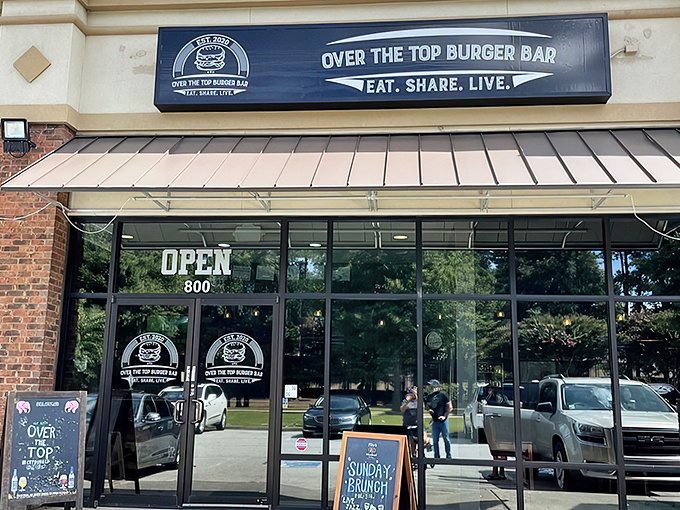 The blue signage beckons like a lighthouse for the hungry. "Eat. Share. Live." isn't just a motto—it's a survival strategy.
