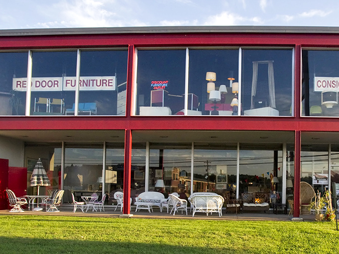 The iconic red-trimmed façade beckons like a siren song to treasure hunters. Inside awaits a wonderland of pre-loved possibilities.