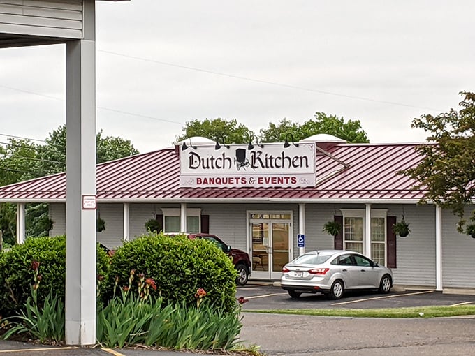 The unassuming exterior of Dutch Kitchen belies the culinary treasures within. That red roof is basically a beacon for hungry travelers across Ohio.