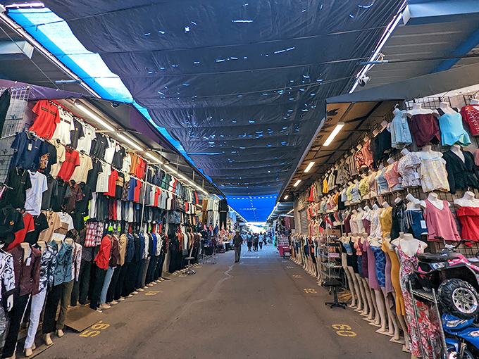 Vendors transform ordinary spaces into retail wonderlands, where steering wheels and luggage compete for your attention and wallet.