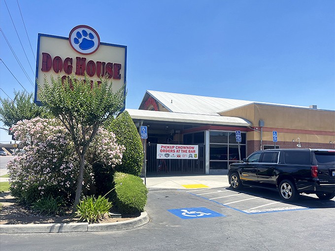 That cheerful blue paw print logo beckons like a friendly neighborhood invitation to burger bliss.