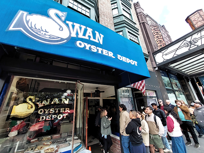 The iconic blue awning of Swan Oyster Depot – San Francisco's seafood institution where time stands deliciously still on Polk Street.