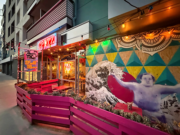Spitz announces itself with vibrant confidence – colorful planters, coral umbrellas, and a promise of döner kebabs that'll make your taste buds stand at attention.