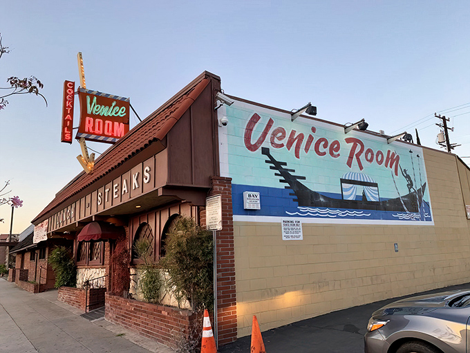 That neon sign isn't just advertising – it's a time portal to an era when cocktails were strong and steaks were king.