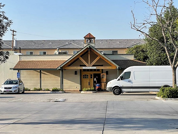 The unassuming exterior of Hodel's Country Dining stands like a beacon of comfort food hope in Bakersfield, promising culinary treasures within those wooden beams.
