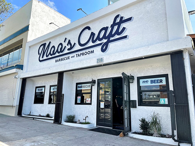 The white facade of Moo's Craft Barbecue stands like a beacon of hope for meat lovers in a city better known for juice cleanses than brisket.