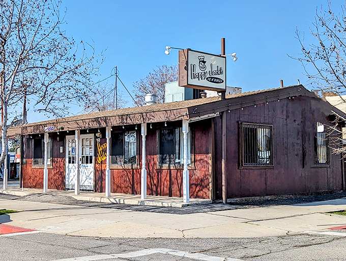 The unassuming facade of Happy Jack's might not scream "culinary destination," but that cowboy mascot knows what you're about to discover inside.