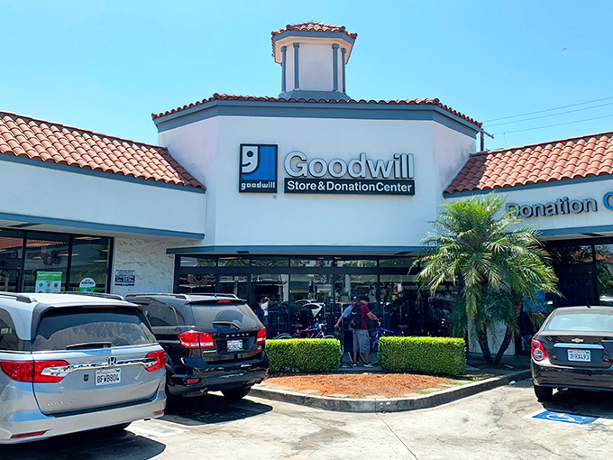 The Spanish-style architecture makes this Goodwill look more like a boutique resort than a thrift store. Those terra cotta roof tiles aren't messing around!