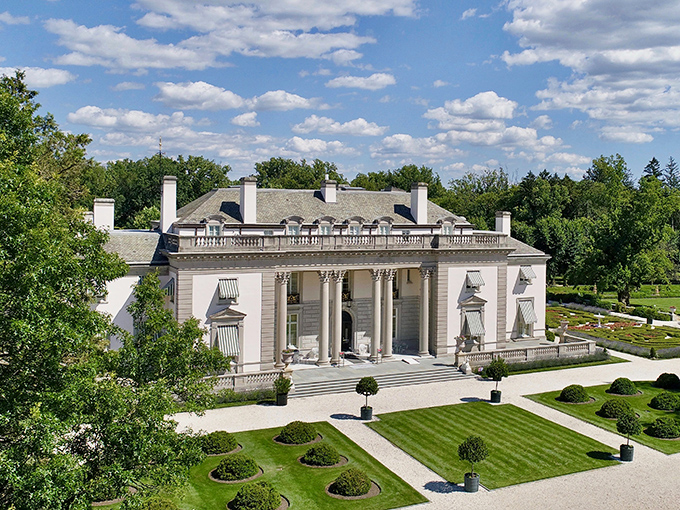 The grand façade of Nemours Estate makes Versailles look like it was working with a modest budget. Pure limestone magnificence.