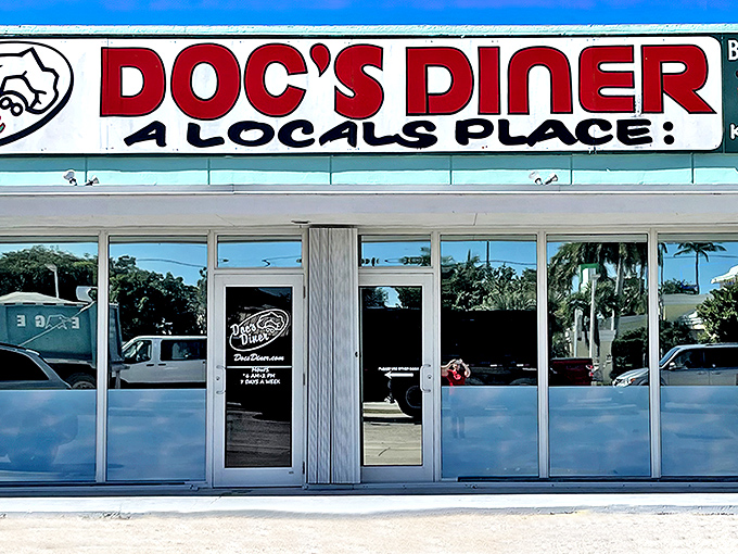 The unassuming exterior of Doc's Diner proudly declares itself "A LOCALS PLACE" – the universal sign that you've stumbled upon culinary gold in Key Largo.