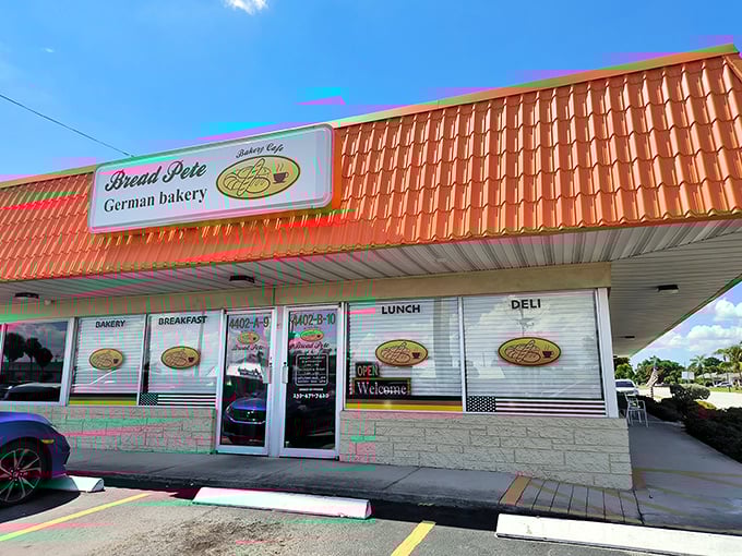 The distinctive orange roof of Bread Pete stands out like a beacon for carb-lovers, promising German baking traditions under the Florida sun.