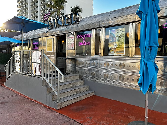 This gleaming silver time machine isn't waiting for Doc Brown – it's serving up nostalgia and killer BBQ ribs on Miami Beach's 11th Street.