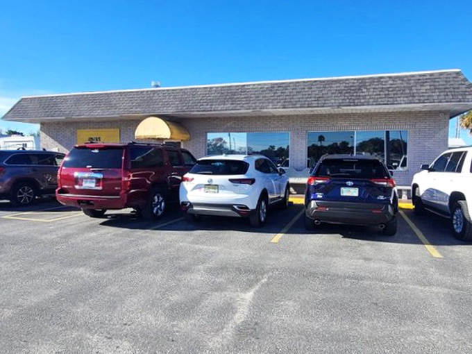 Don't let the modest brick exterior fool you—this unassuming building houses breakfast magic that has locals lining up before the doors even open.