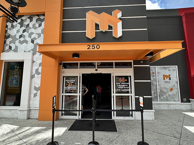 The Museum of Illusions beckons with its bold façade at ICON Park, promising a reality check your brain isn't quite ready for.