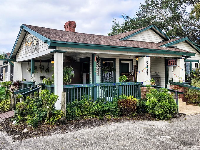 The unassuming white cottage with mint-green trim might fool you, but locals know this humble facade hides seafood treasures that would make Neptune himself jealous.