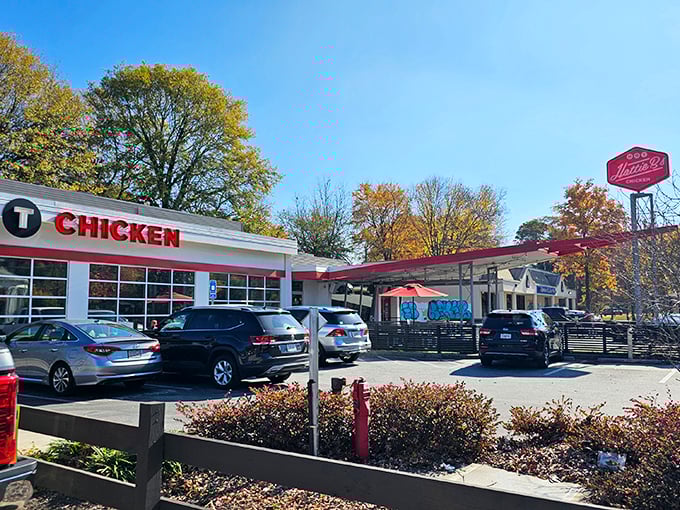 The bold red "HOT CHICKEN" sign isn't just advertising—it's a warning and a promise. This unassuming building houses flavor explosions waiting to happen.